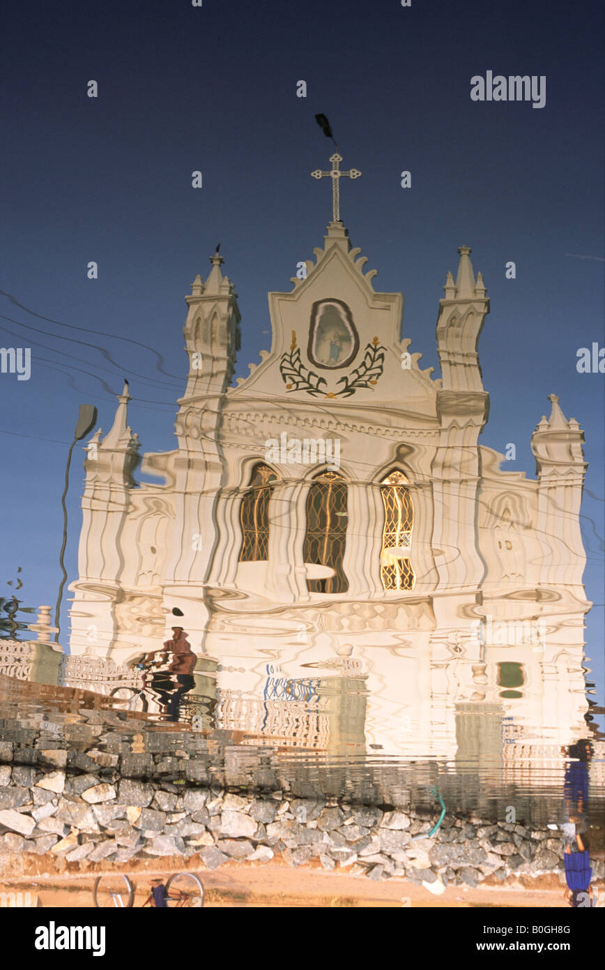 The exterior of St Theresa's Church reflected in the water of the River ...