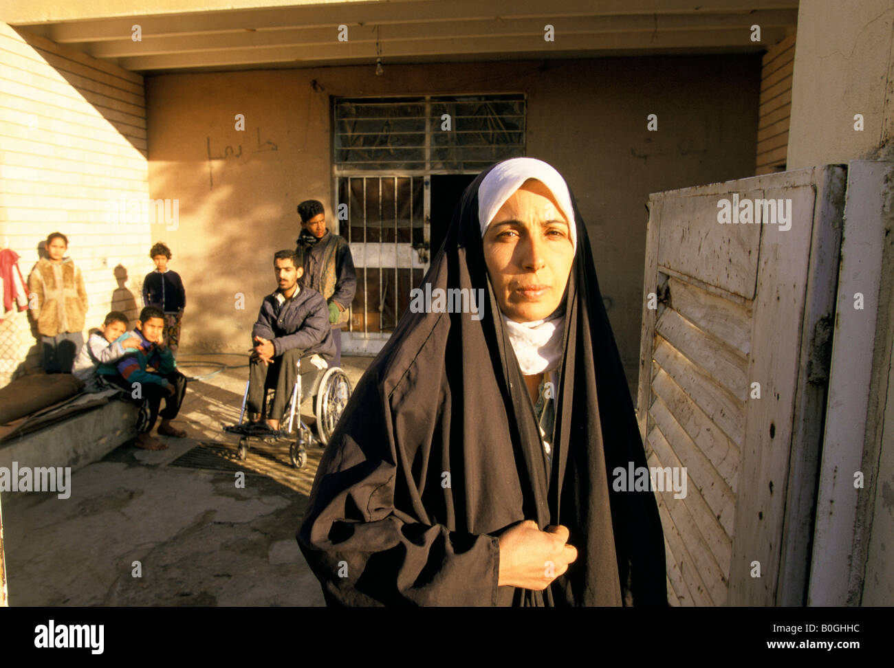Homeless family living in an abandoned mental asylum, Baghdad, Iraq ...