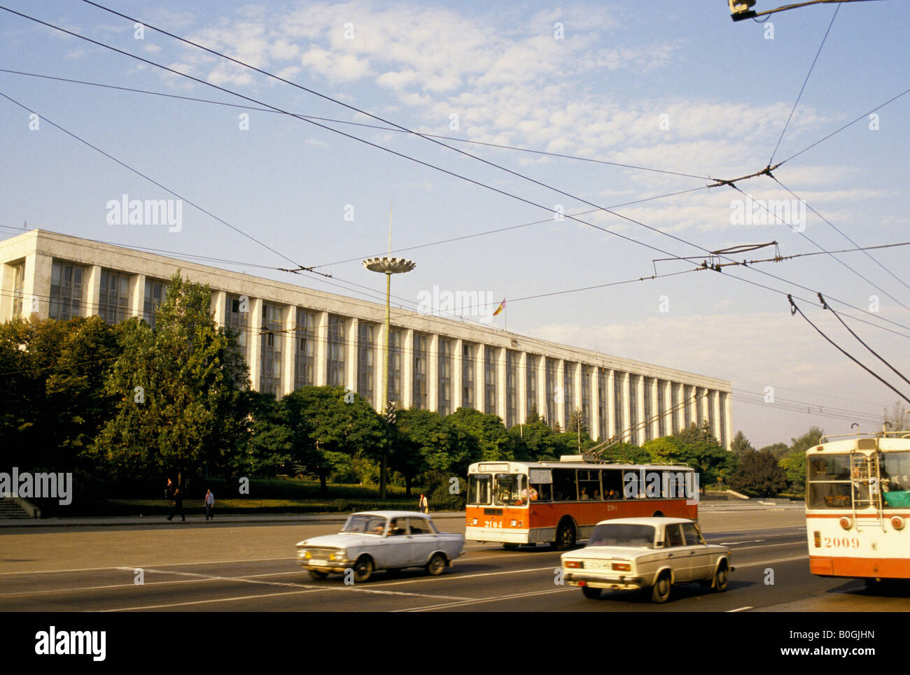 Cars and buses travelling by the town hall in Chisinau, Moldova Stock ...