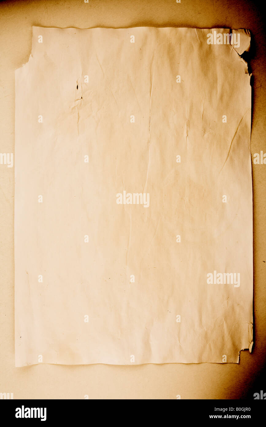 Old and worn sheet of paper Stock Photo - Alamy