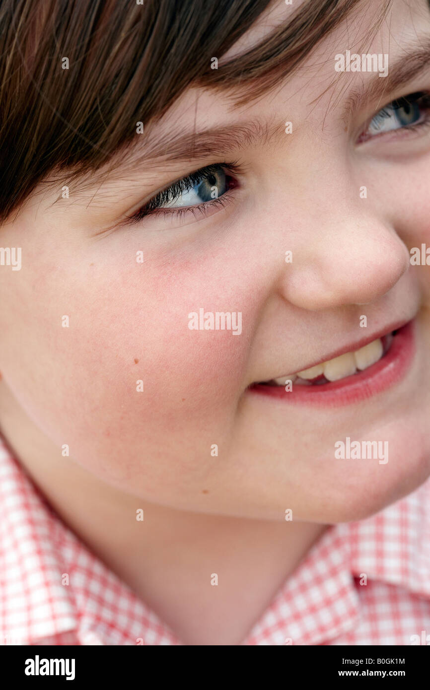 Pretty young student, in uniform, aged seven Stock Photo - Alamy