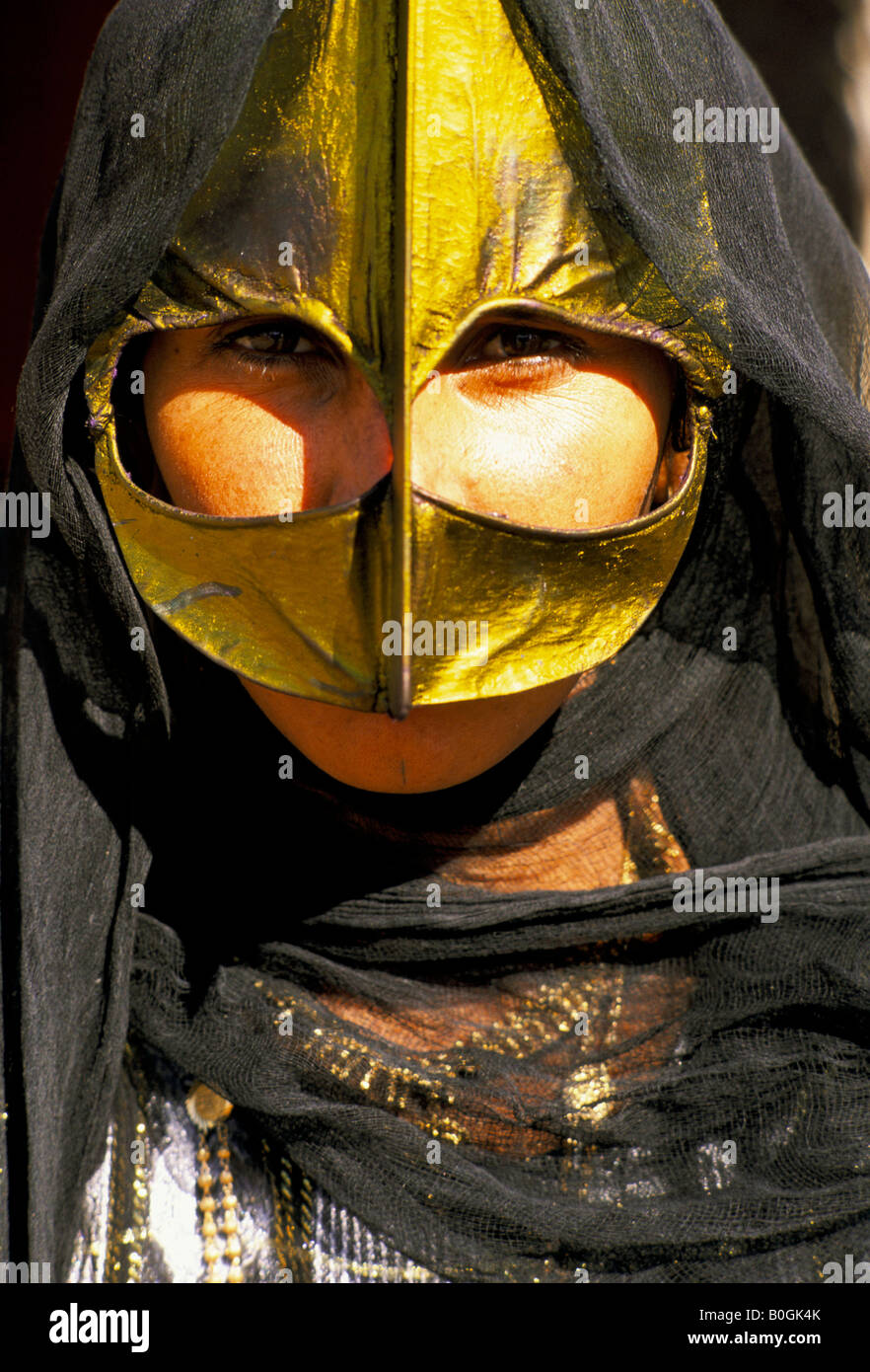 Portrait of an Al Wahibi woman wearing a face mask, Oman Stock Photo ...
