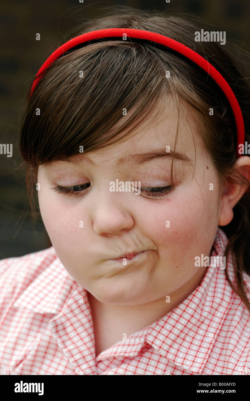Pretty young student, in uniform, aged seven Stock Photo - Alamy