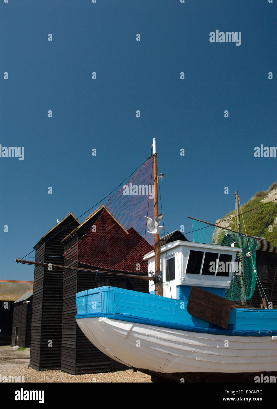 Old fishing boats and net huts "net shops" on the Stade maritime ...
