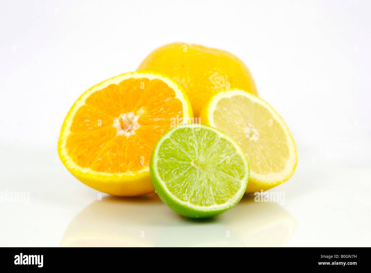 Citrus fruit isolated against a white background Stock Photo - Alamy