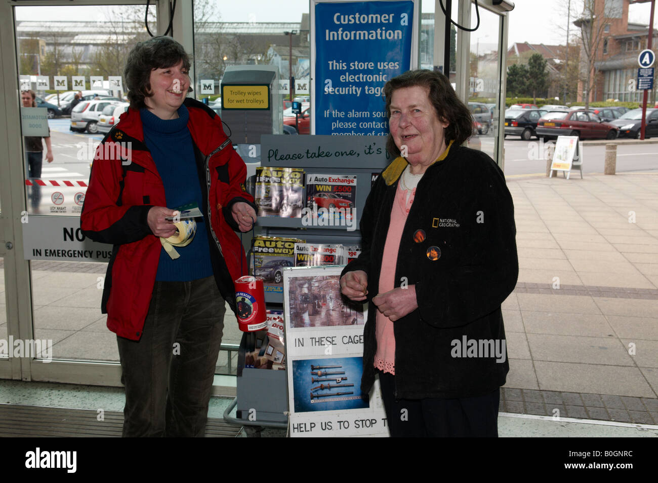 Woman charity collecting tin hi-res stock photography and images - Alamy