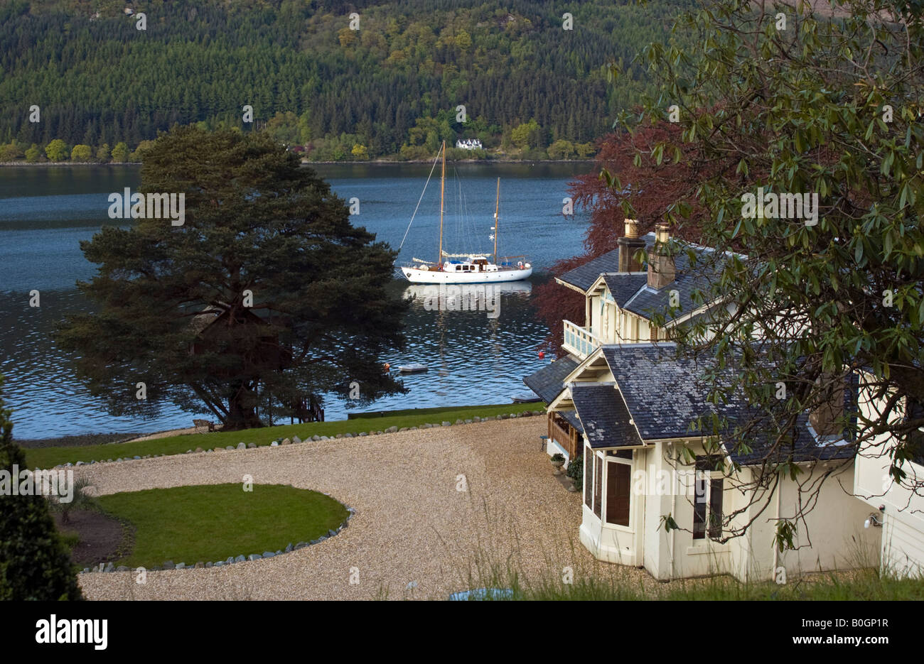 The Lodge Hotel located at Loch Goil, Argyll, Scotland with yacht on ...