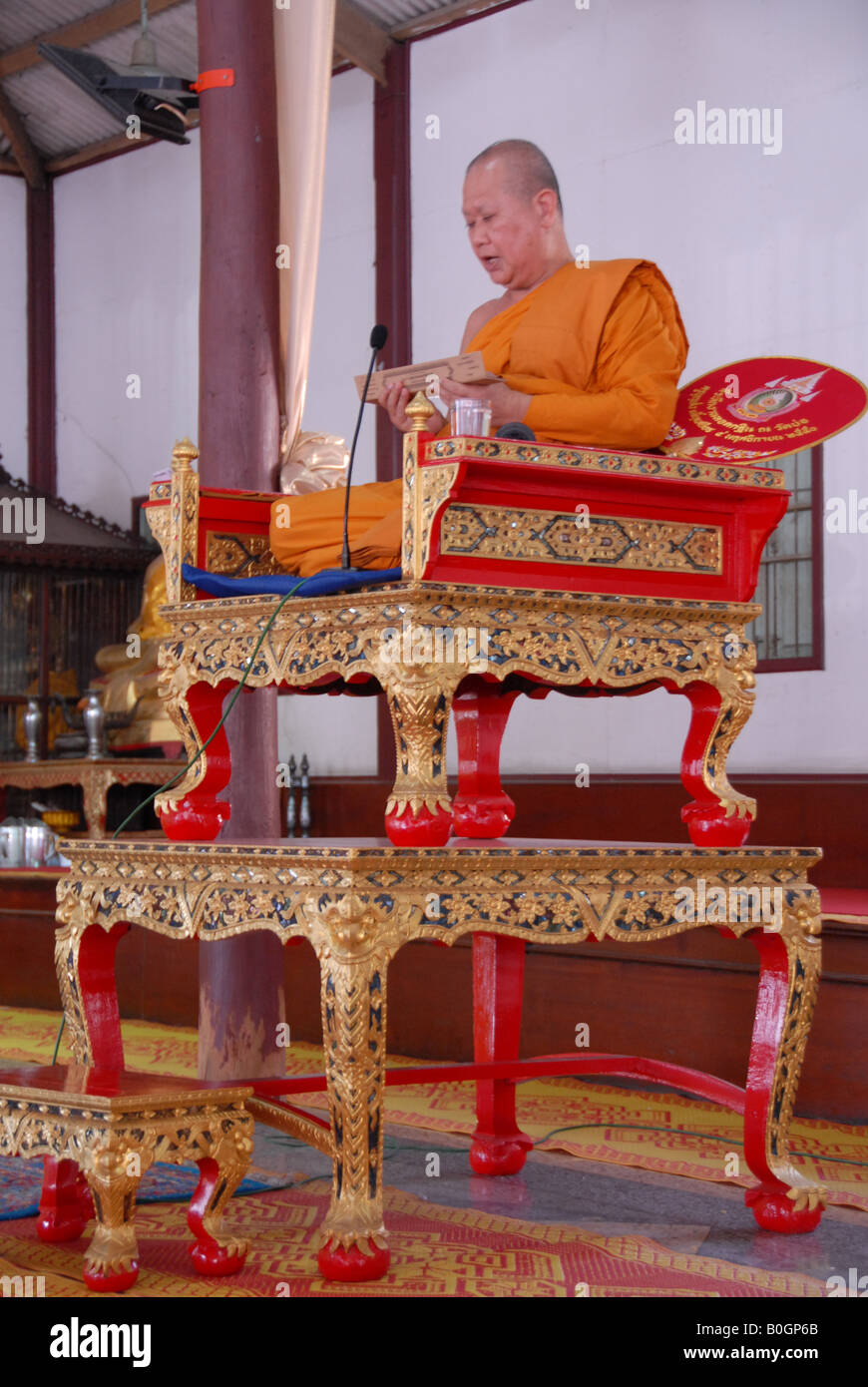 abbot of the temple is giving a sermon , wat bor , bangkok , thailand ...