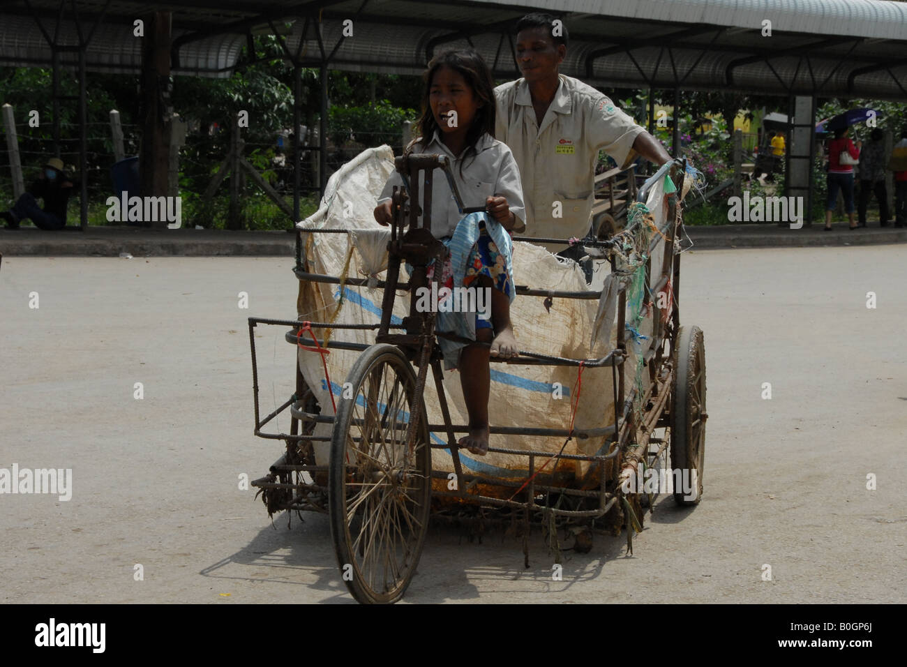 everyone has to work, no exception! little khmer girl is working by ...