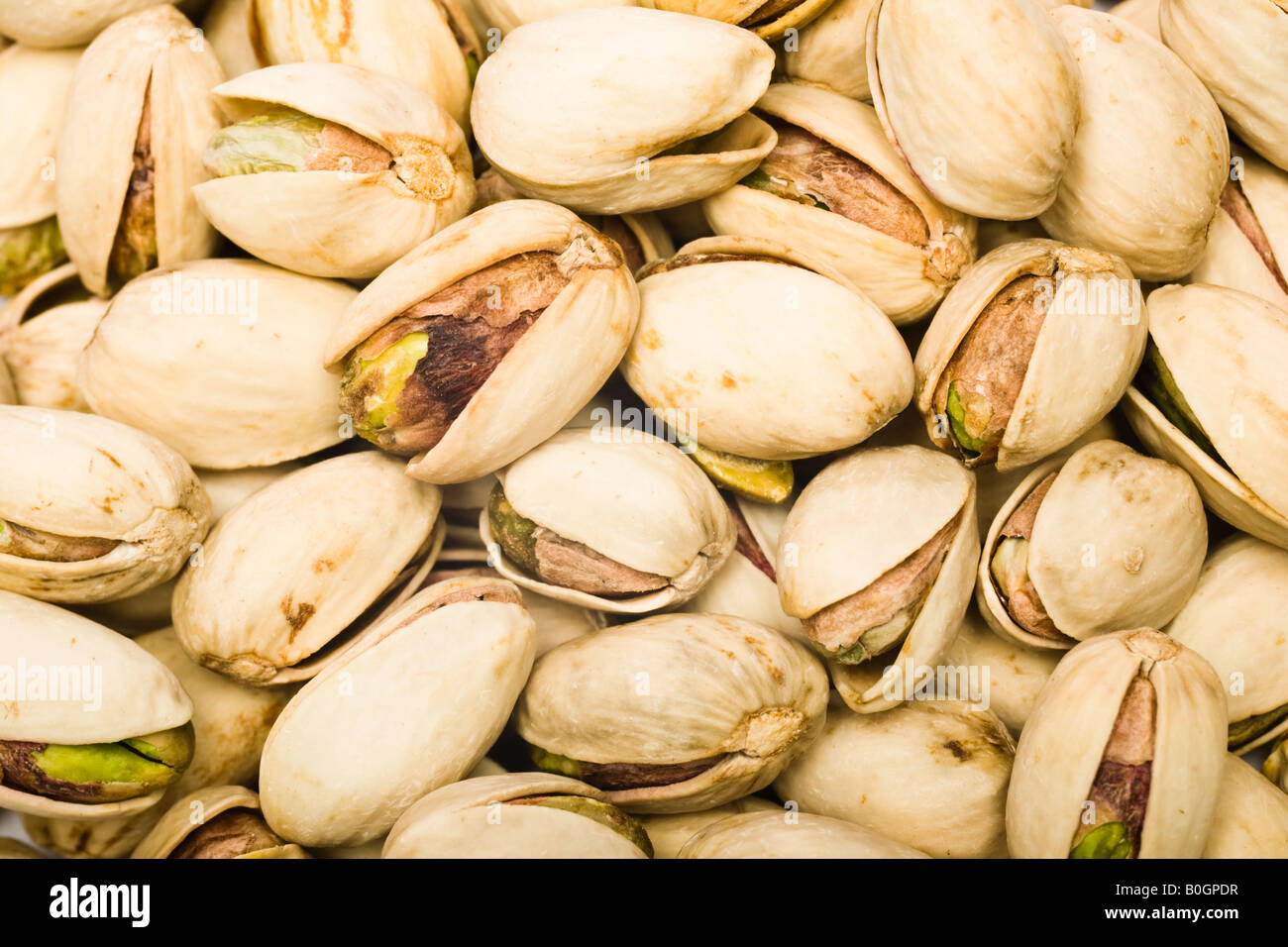 Pistachio nuts pile Stock Photo - Alamy