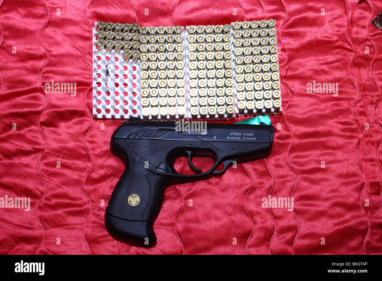 bullets with a gun Stock Photo - Alamy