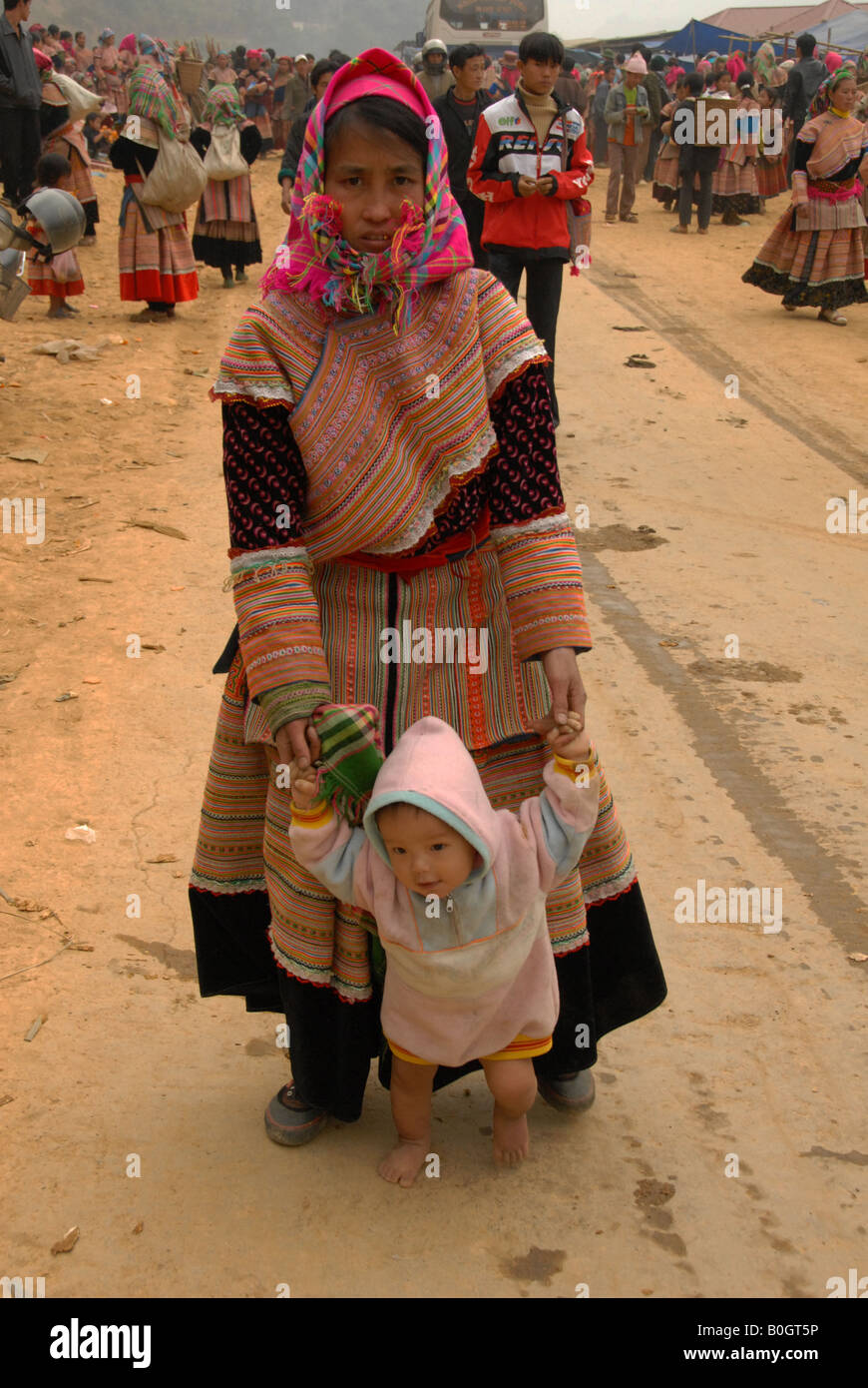 flower hmong girl with her baby at bac ha saturday market Stock Photo ...