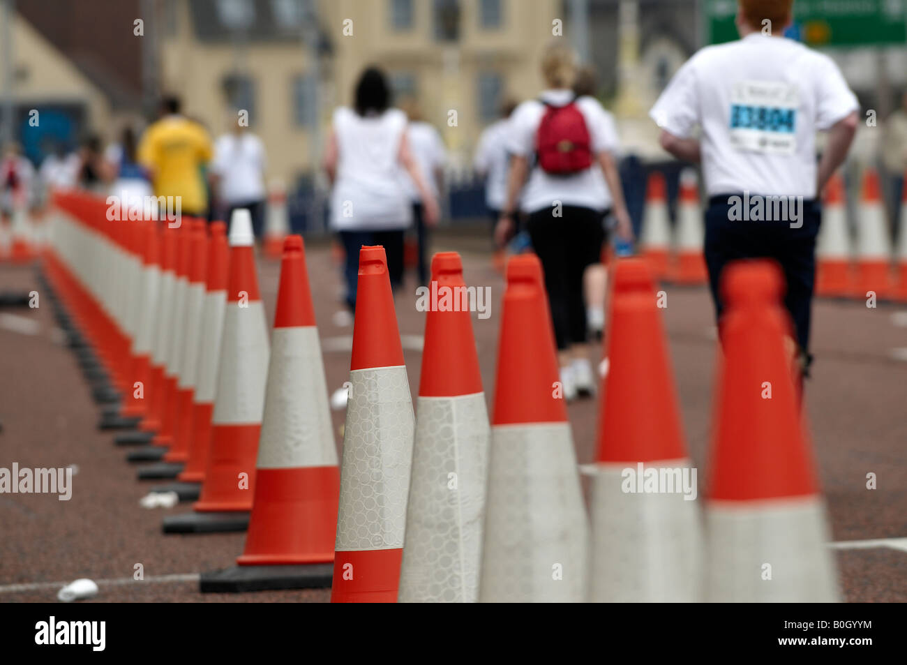 Traffic cones being used to direct marathon runners Stock Photo - Alamy