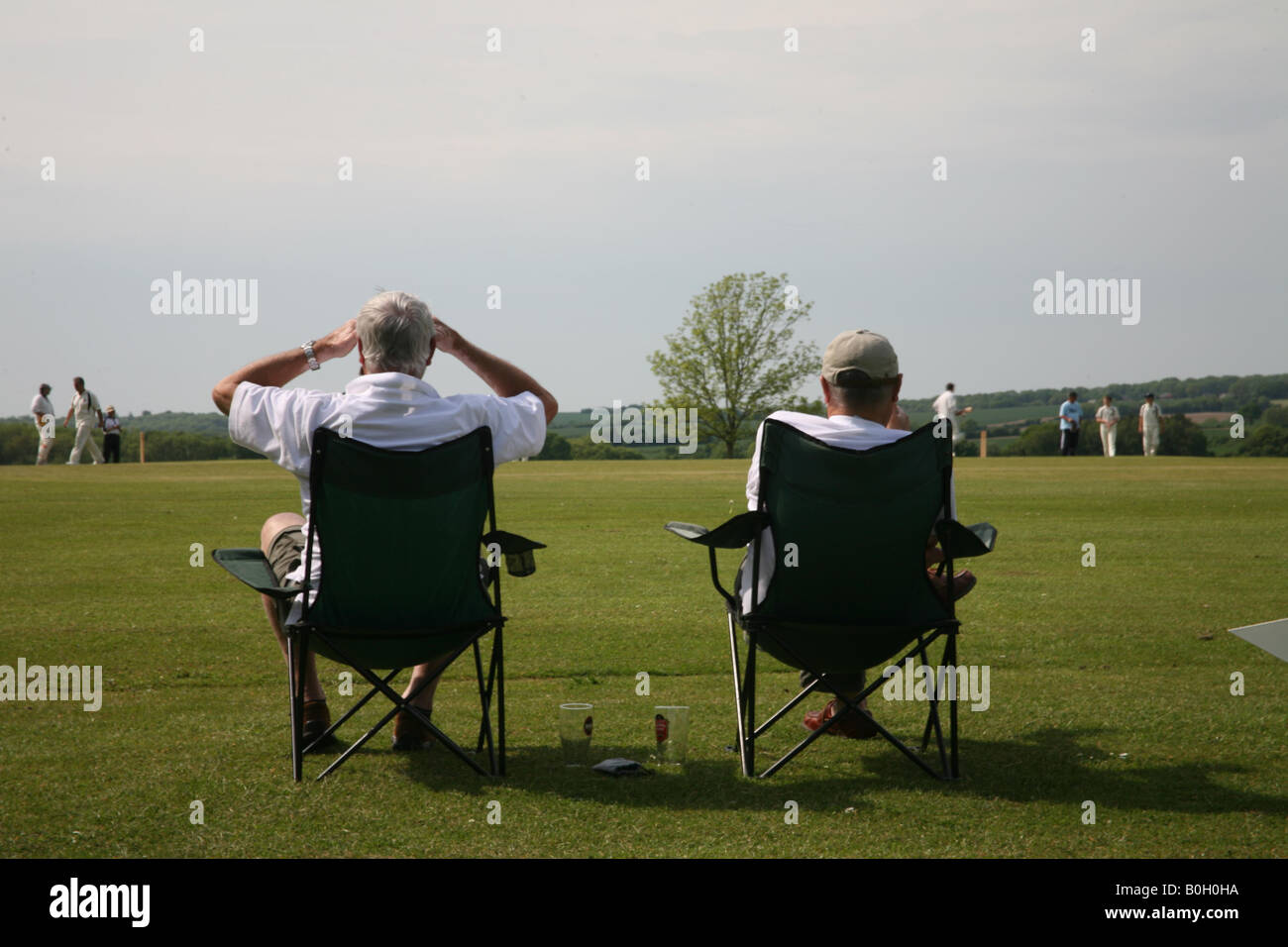 Watching village cricket hi-res stock photography and images - Alamy