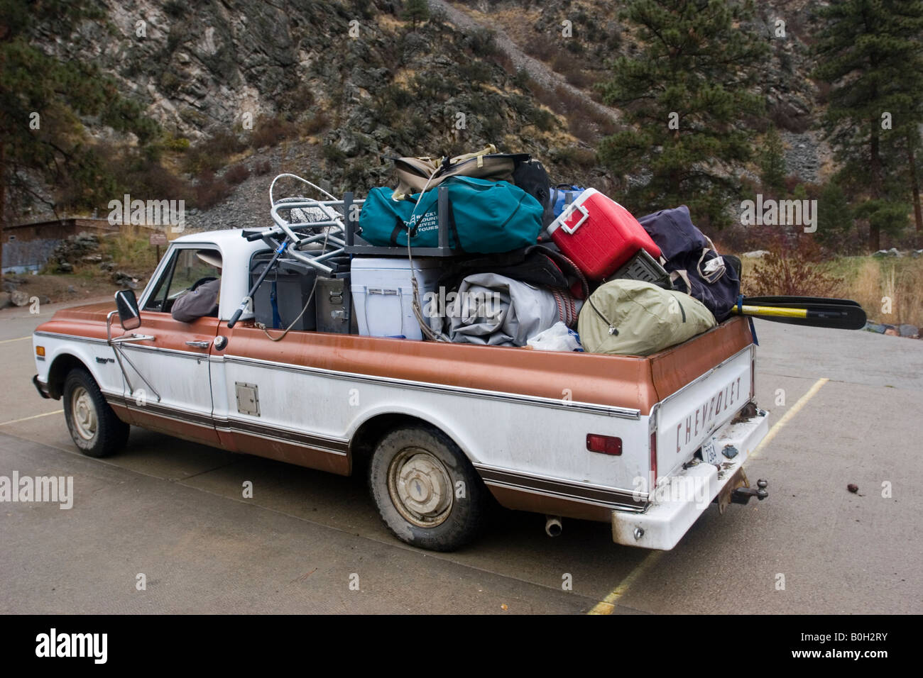 Idaho Truck overloaded with raft gear at Corn Creek launch in late fall ...