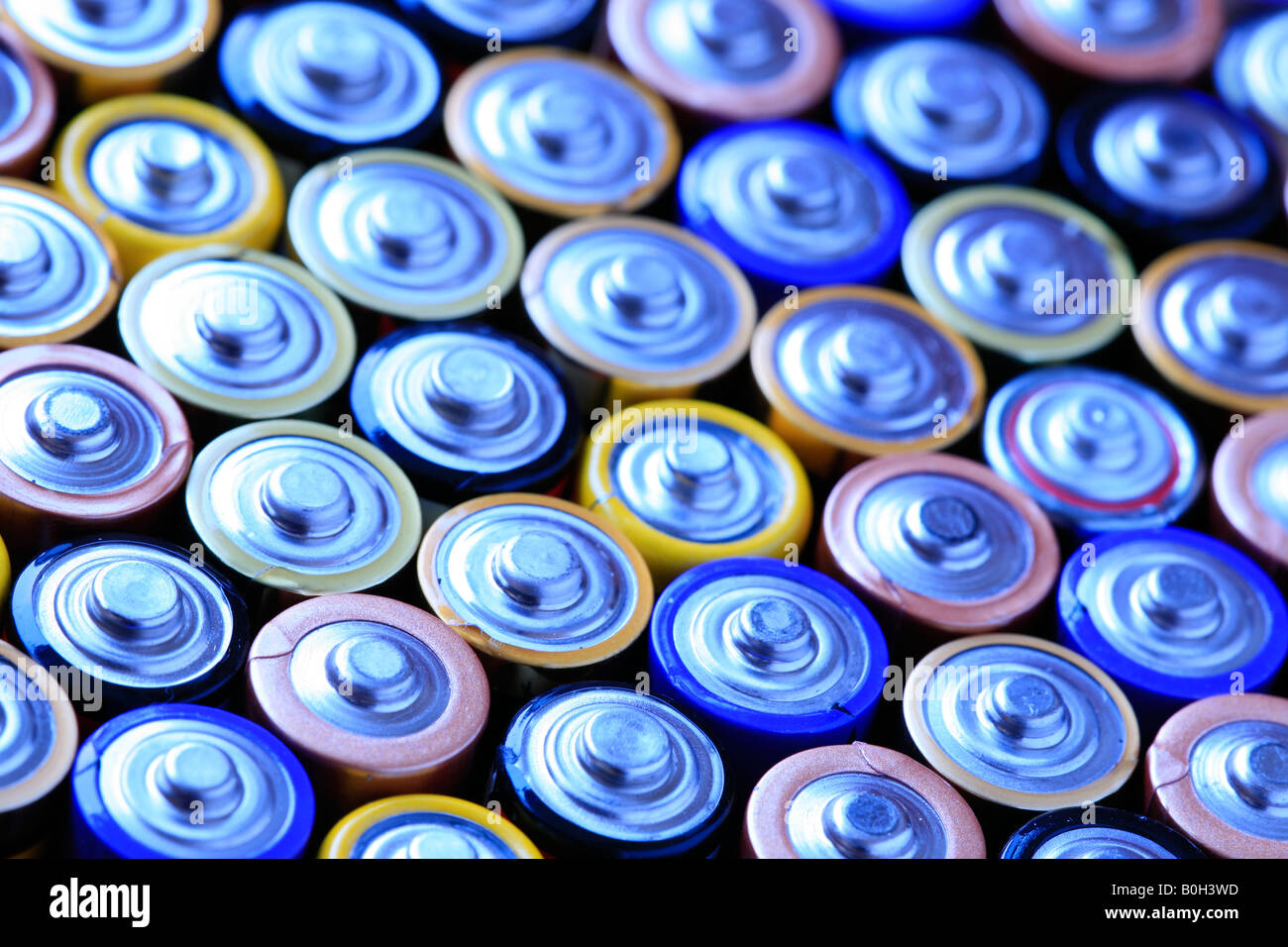 batteries in blue light Stock Photo - Alamy