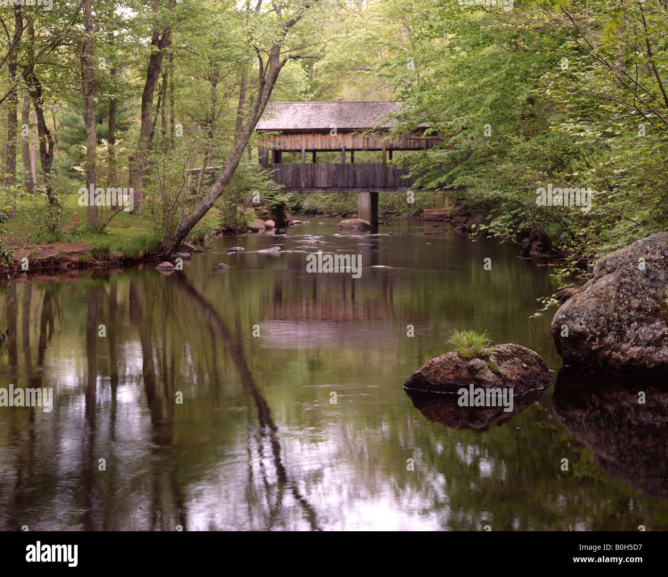 Covered Bridge over River Stock Photo - Alamy