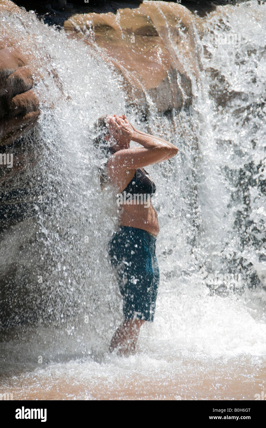 Woman bathing in waterfall hi-res stock photography and images - Alamy