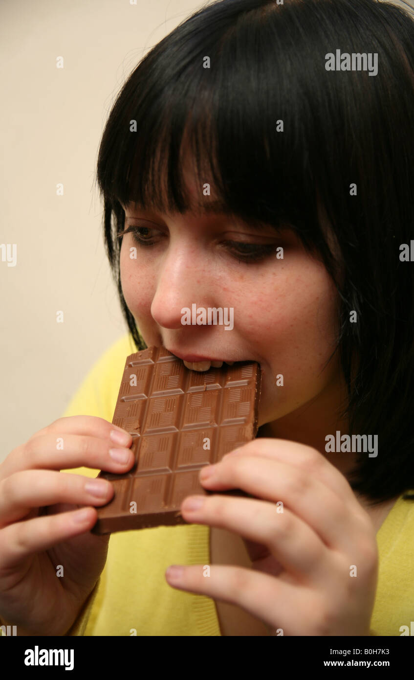 Overweight girl comfort eating hi-res stock photography and images - Alamy