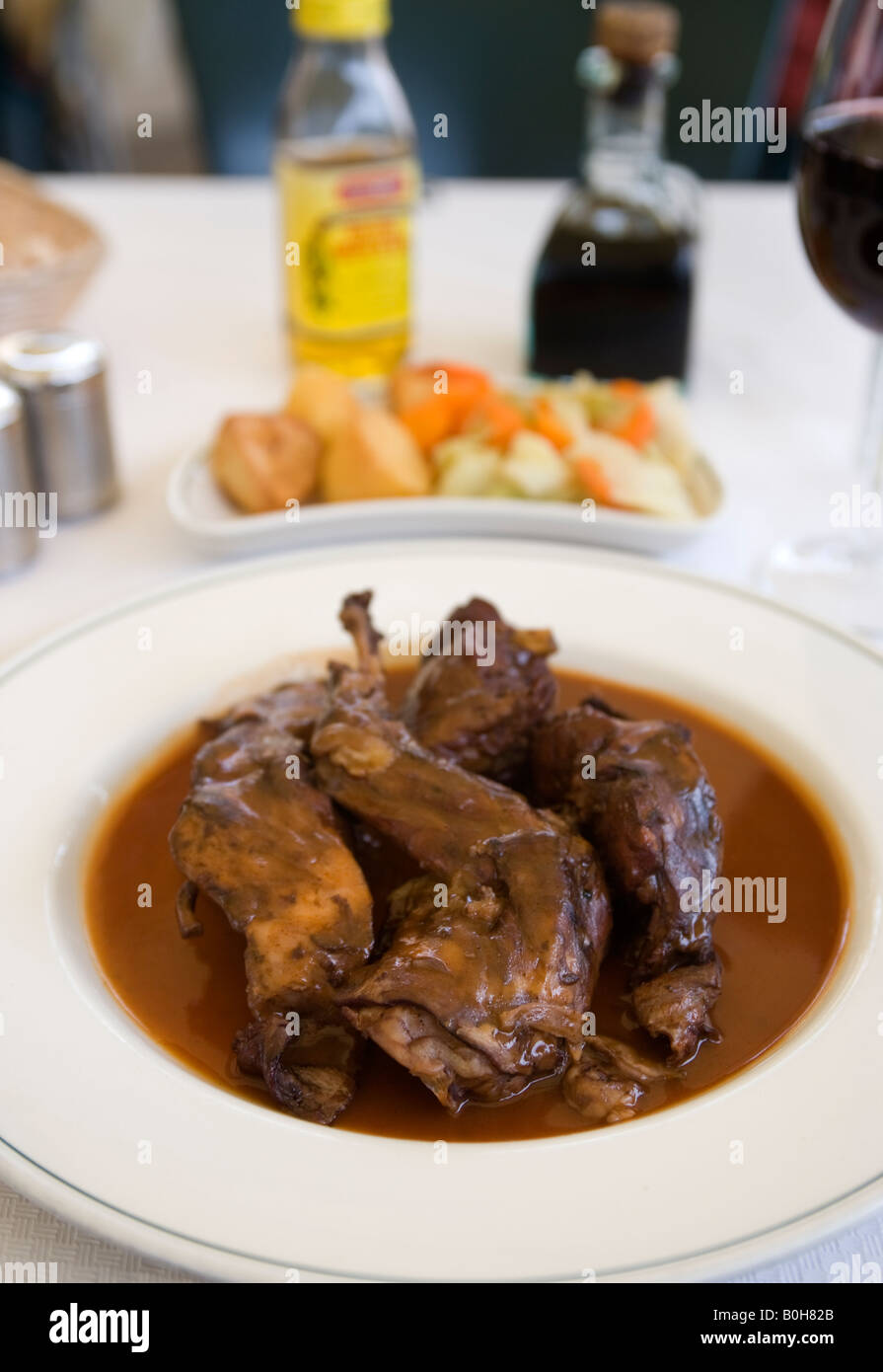 Rabbit Glazed with Red Wine and Fried with Garlic and Mixed Spices ...