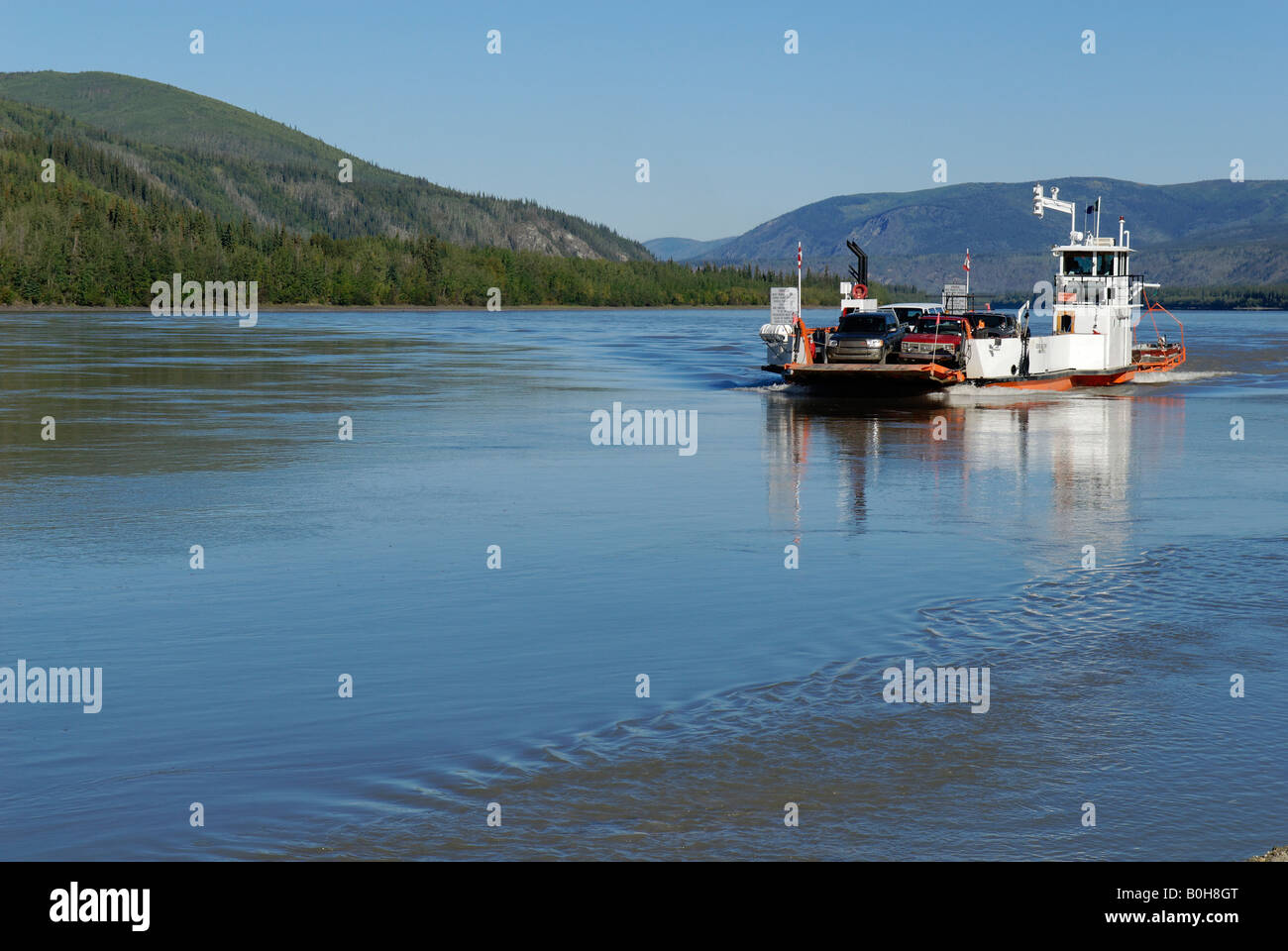 Public car ferry crossing the Yukon River, Yukon Territory, Canada ...