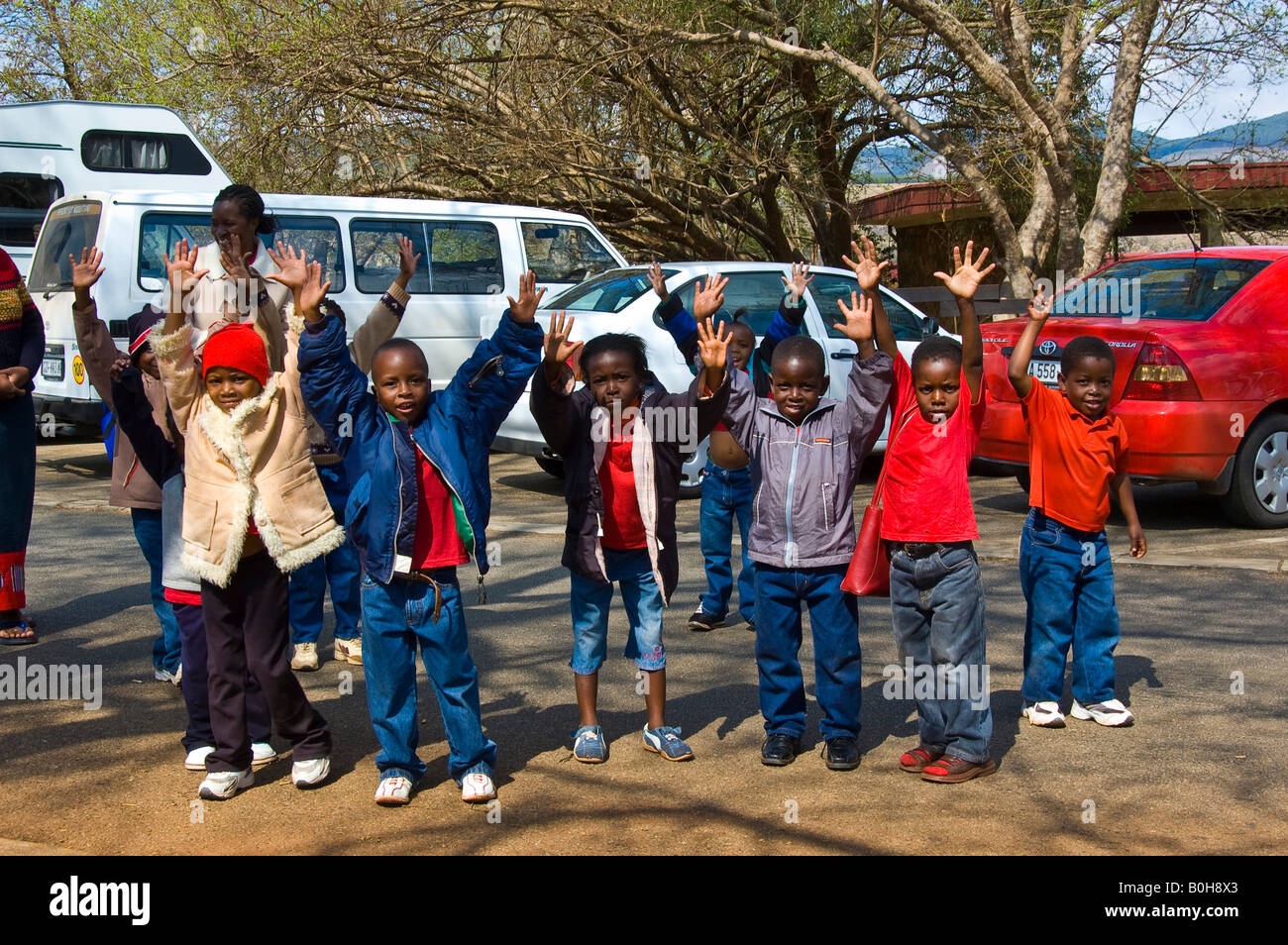 Black children waving, South Africa Stock Photo - Alamy