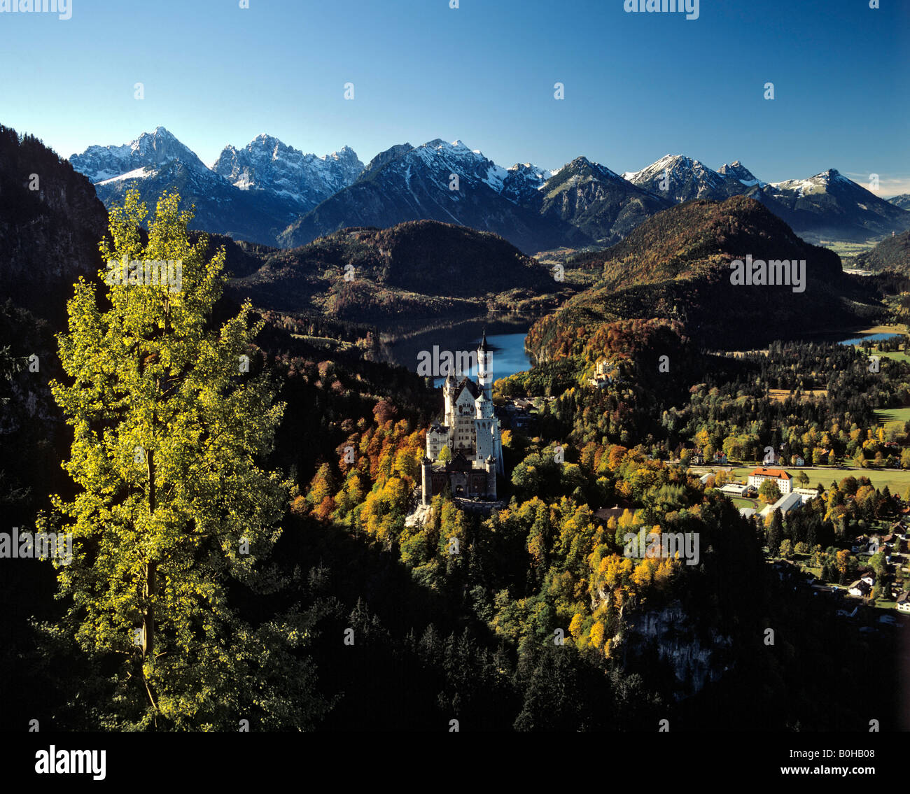 Neuschwanstein Castle, panoramic view in autumn, Alpsee, Allgaeu Alps ...