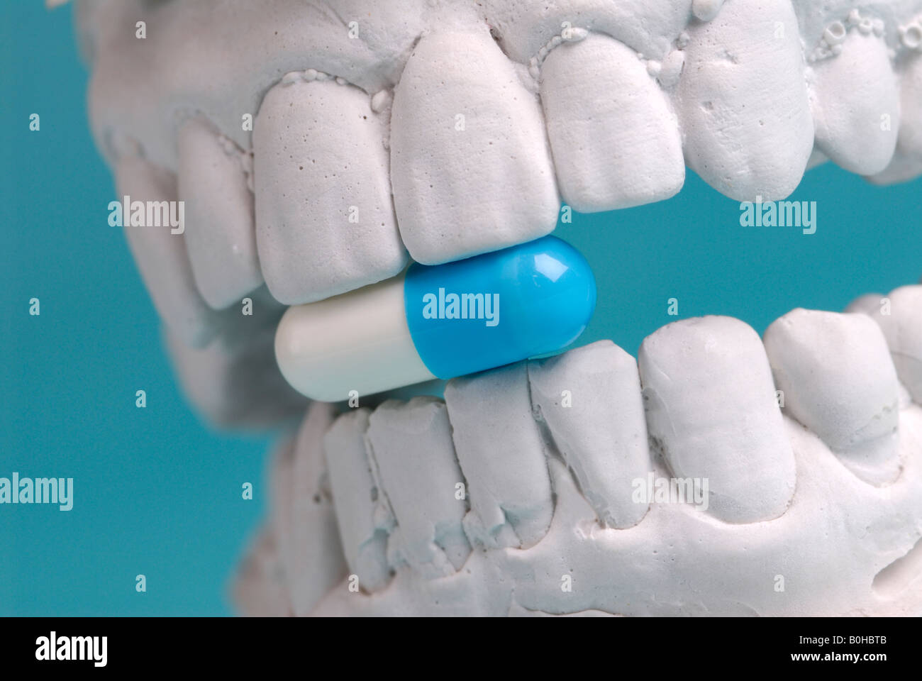 Pills and teeth Stock Photo - Alamy