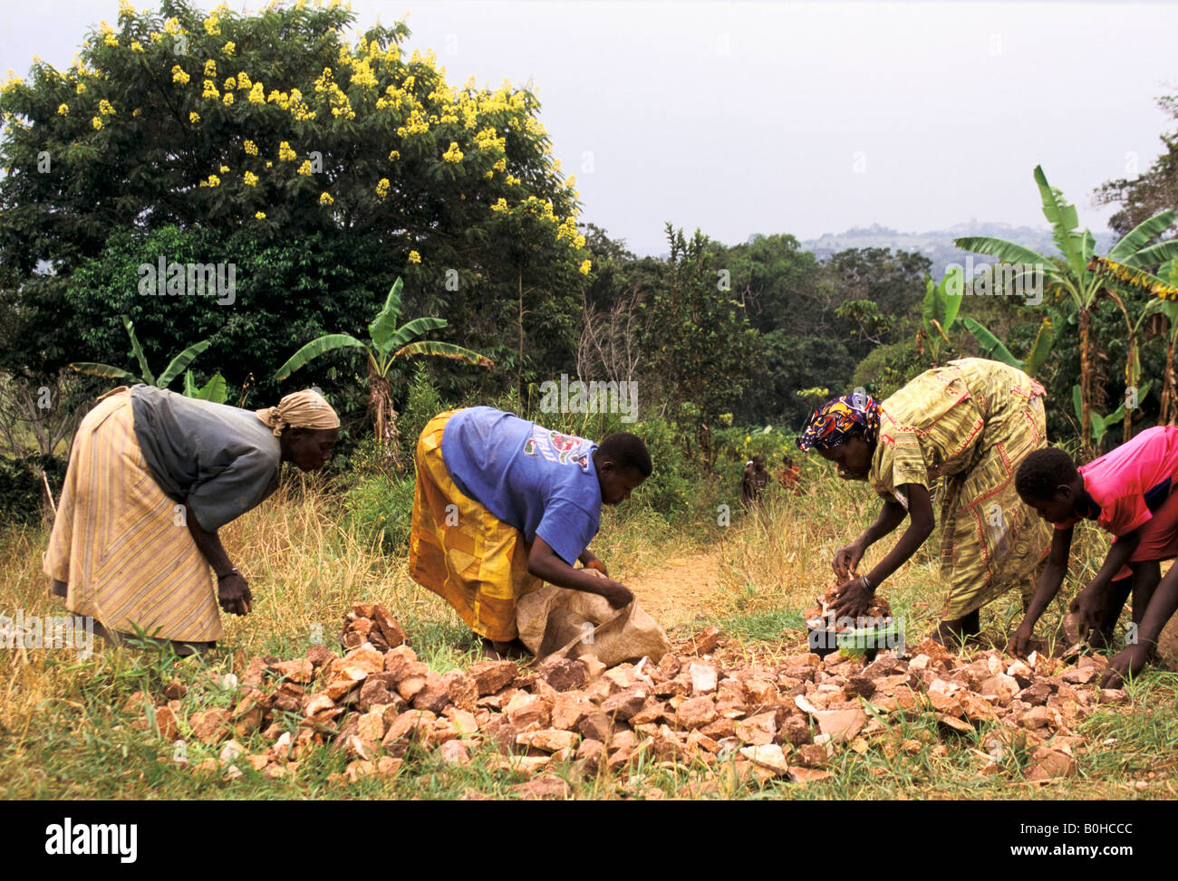 Four women collecting water hi-res stock photography and images - Alamy