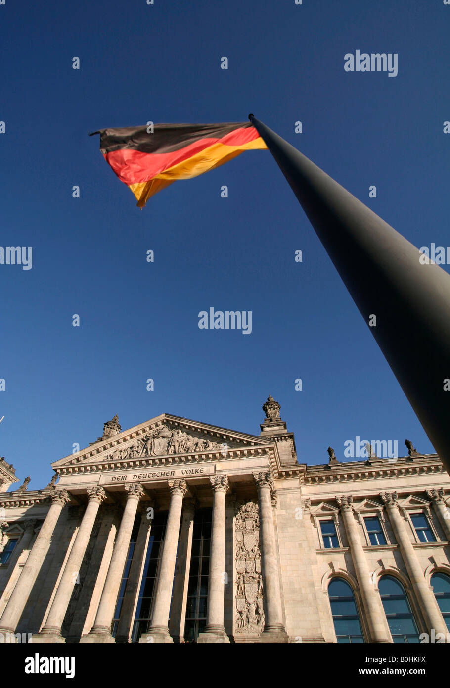 German flag flying next to the reichstag german parliament building hi ...