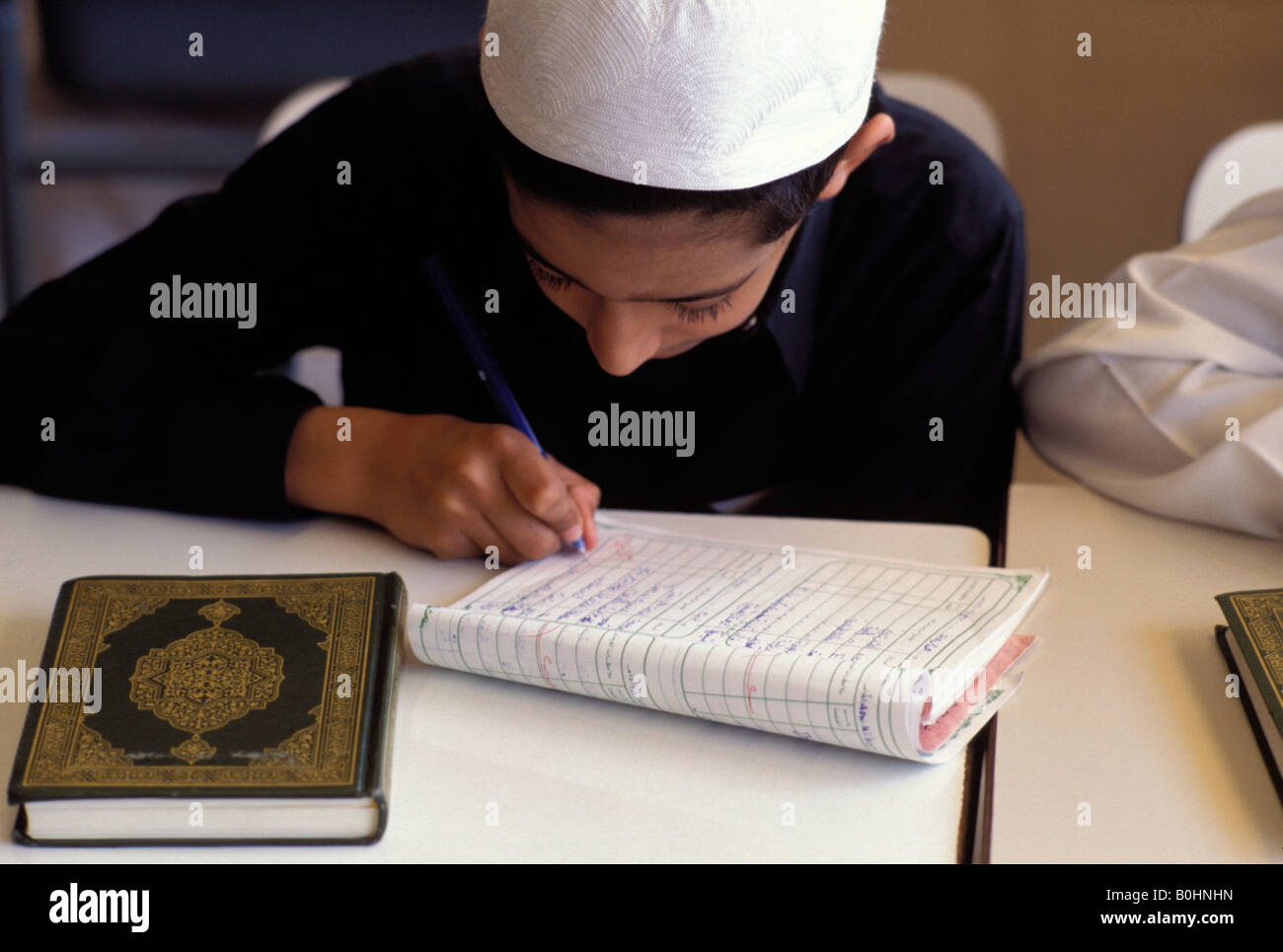 Saudi arabian boy writing hi-res stock photography and images - Alamy