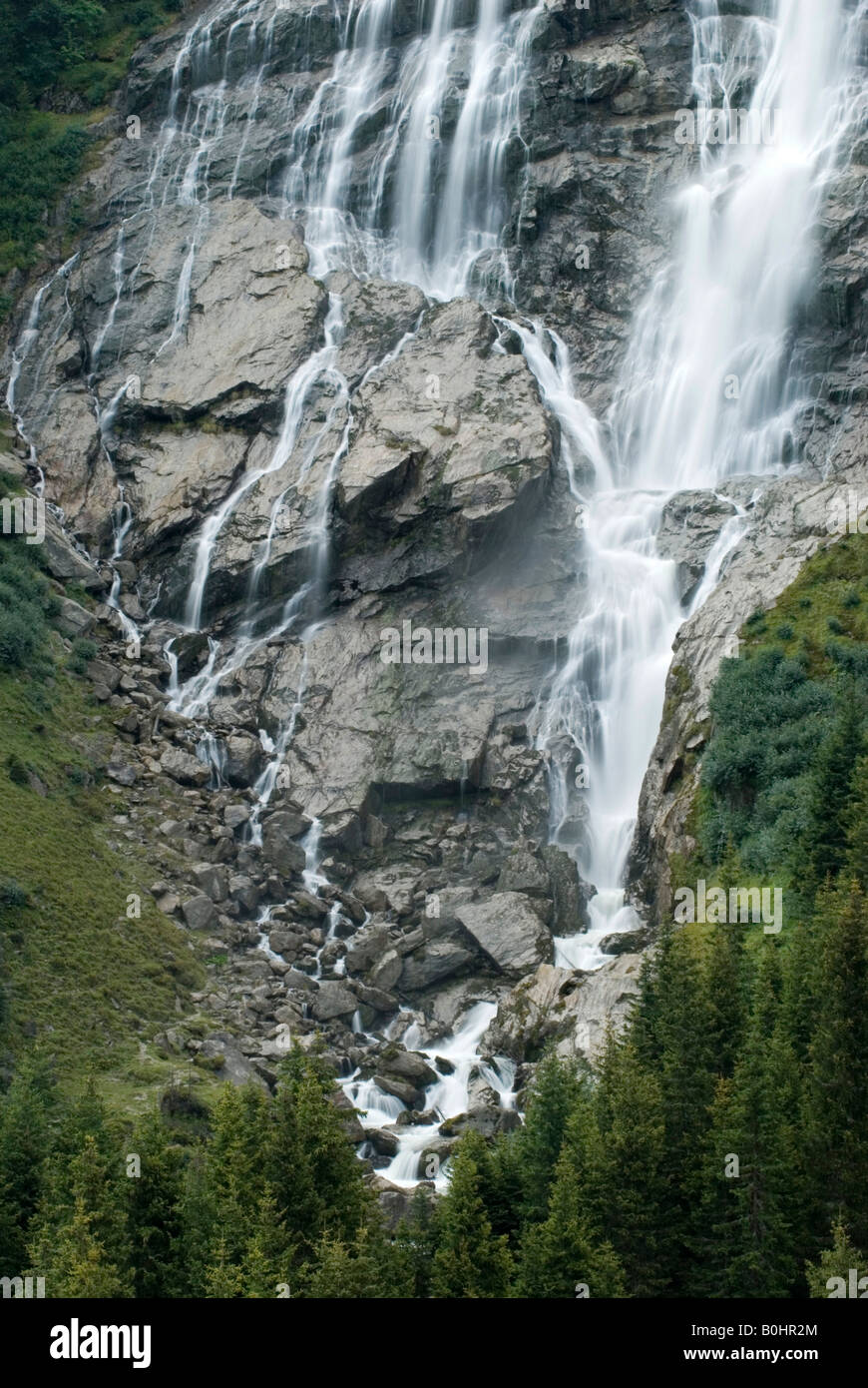 Water pouring down the rocks of the Grawa-Wasserfall waterfalls in the ...