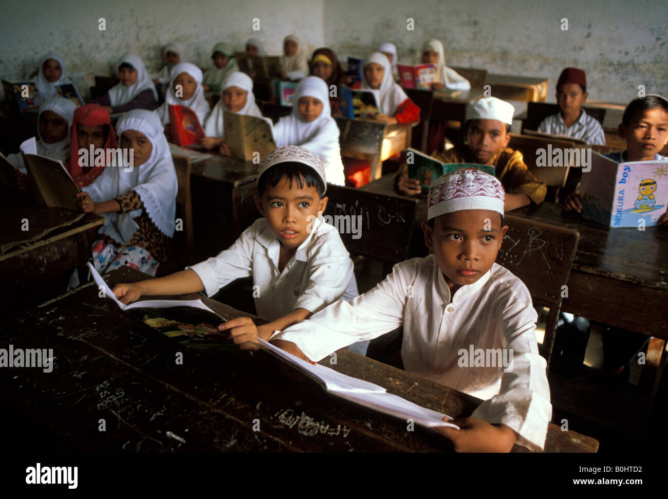 Muslim children in class at a primary school, Indonesia Stock Photo - Alamy