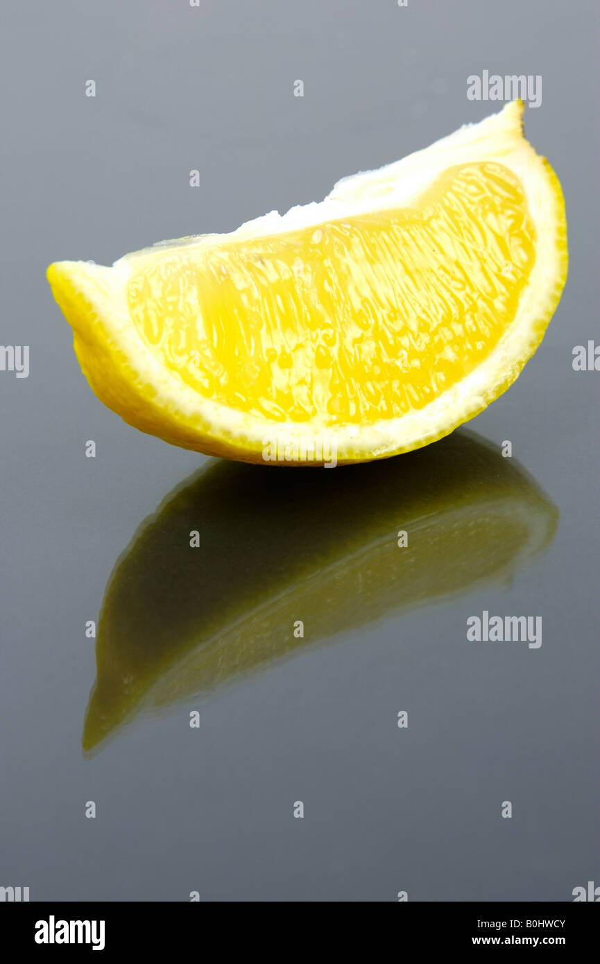 A wedge of lemon Stock Photo - Alamy
