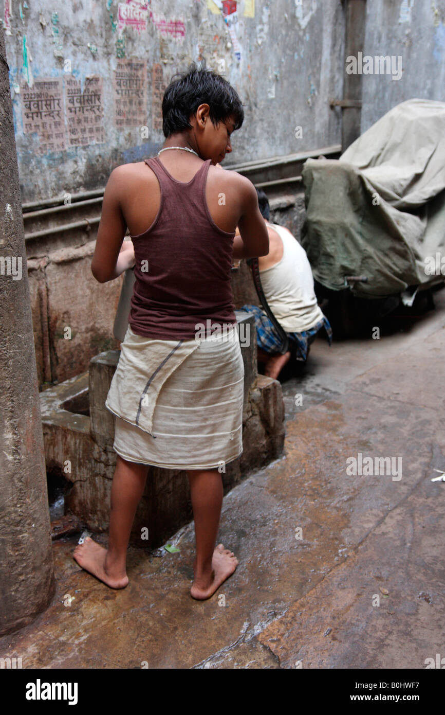 Washing himself hi-res stock photography and images - Alamy