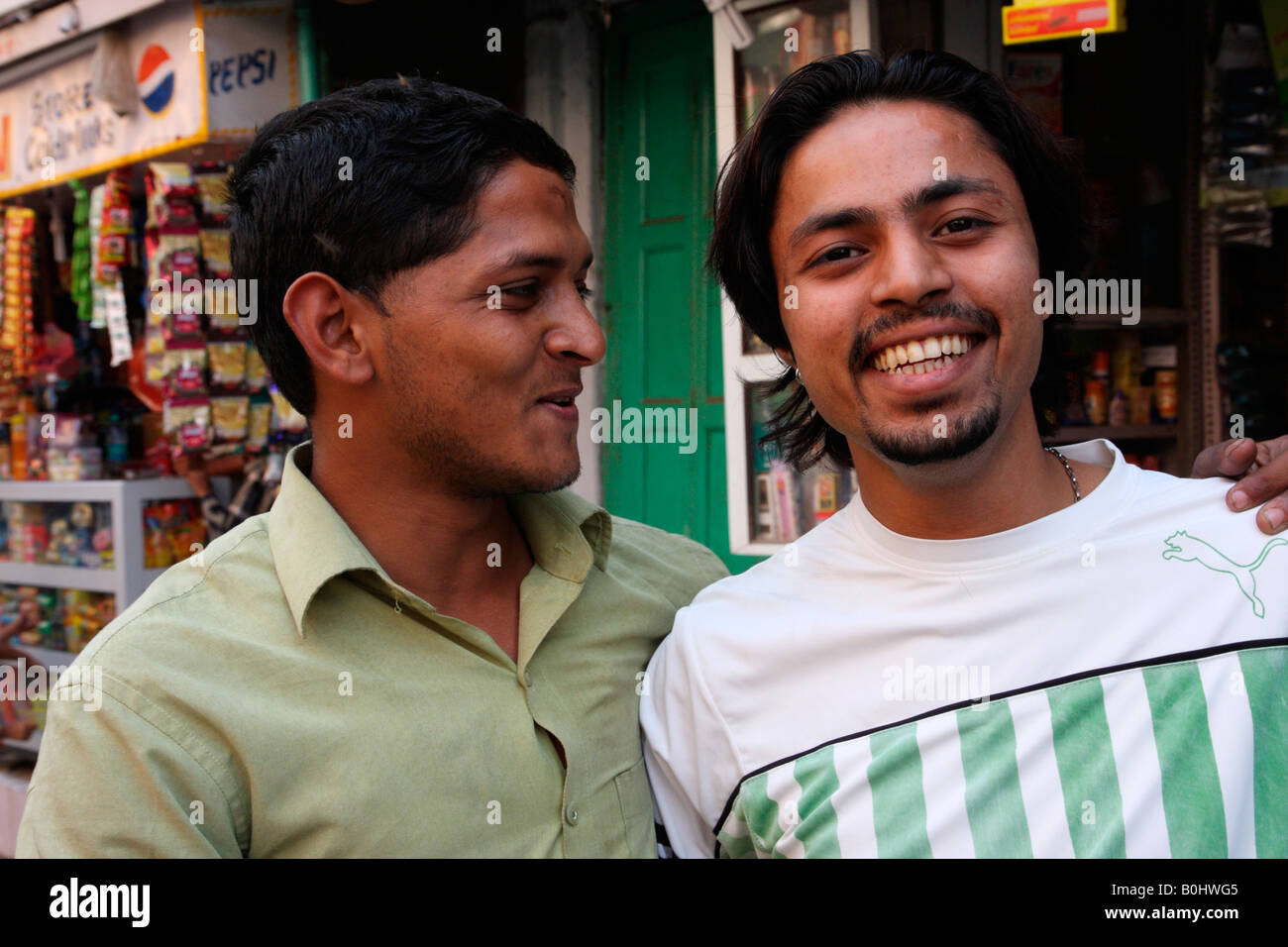 Two Hindu men are smiling on the street in Delhi India Stock Photo - Alamy
