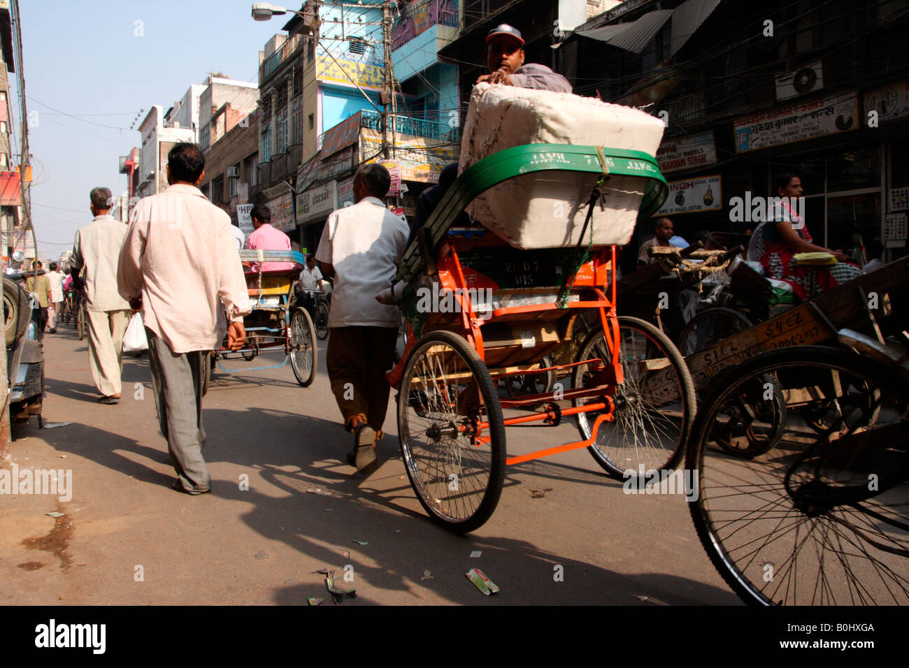Rickshaws in street old delhi hi-res stock photography and images - Alamy