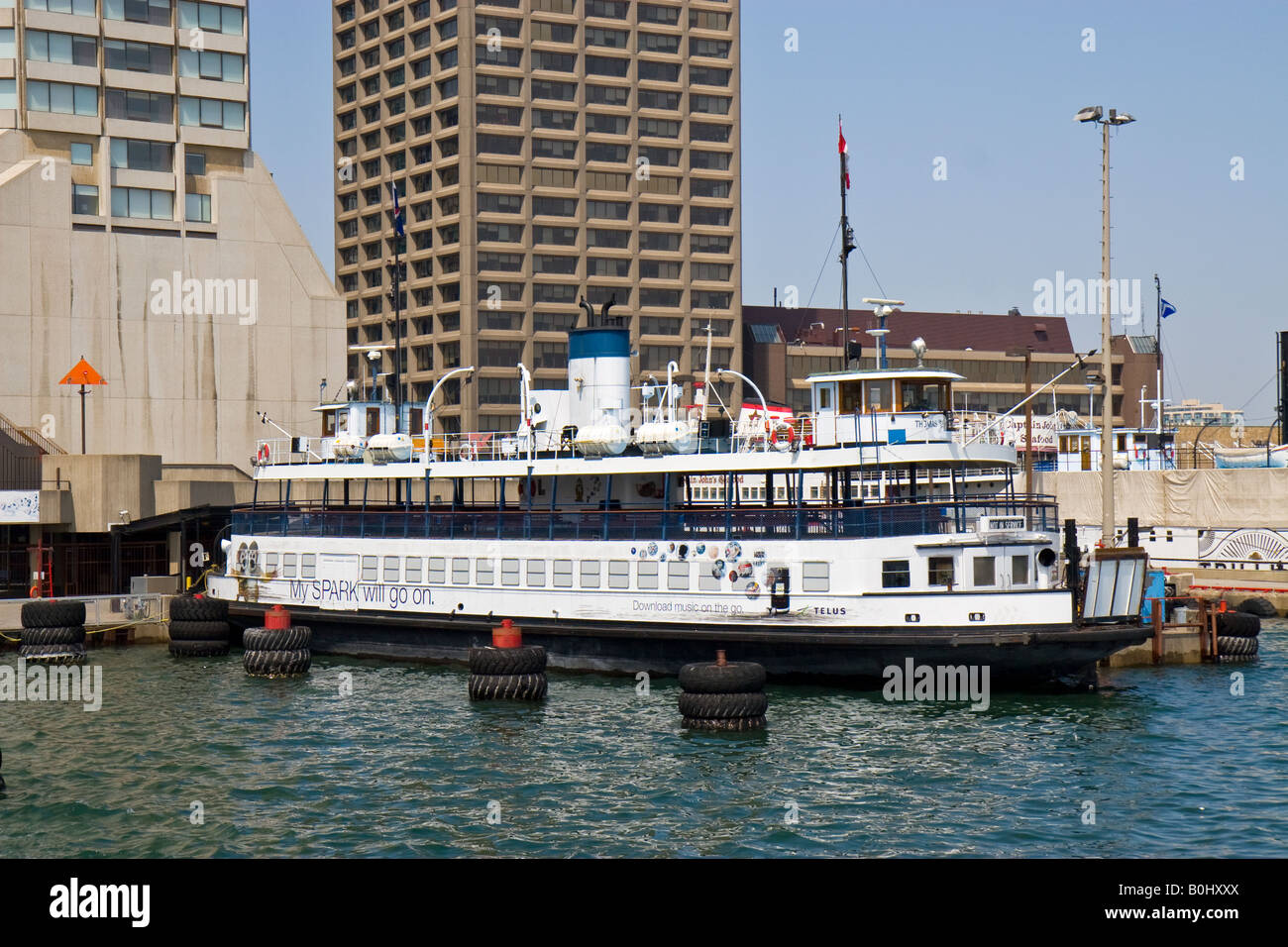 A Toronto ferry ship getting ready to take on passengers Stock Photo ...