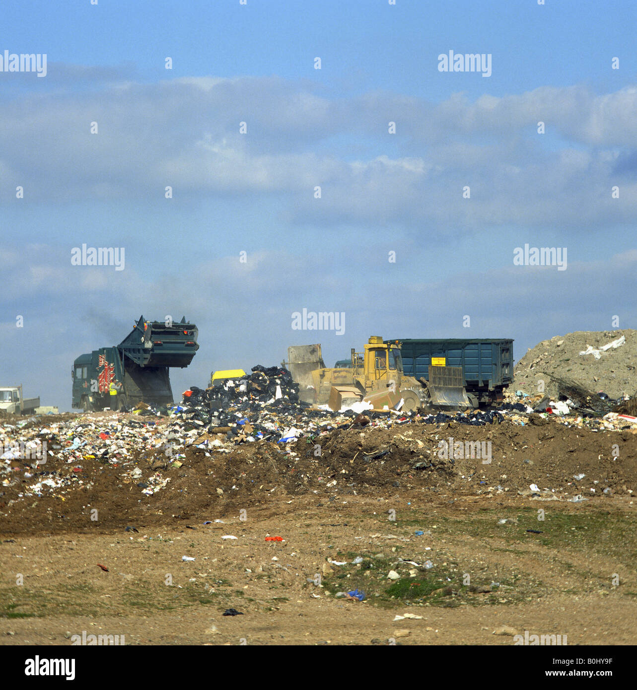 Refuse Vehicles on a Tip Stock Photo - Alamy