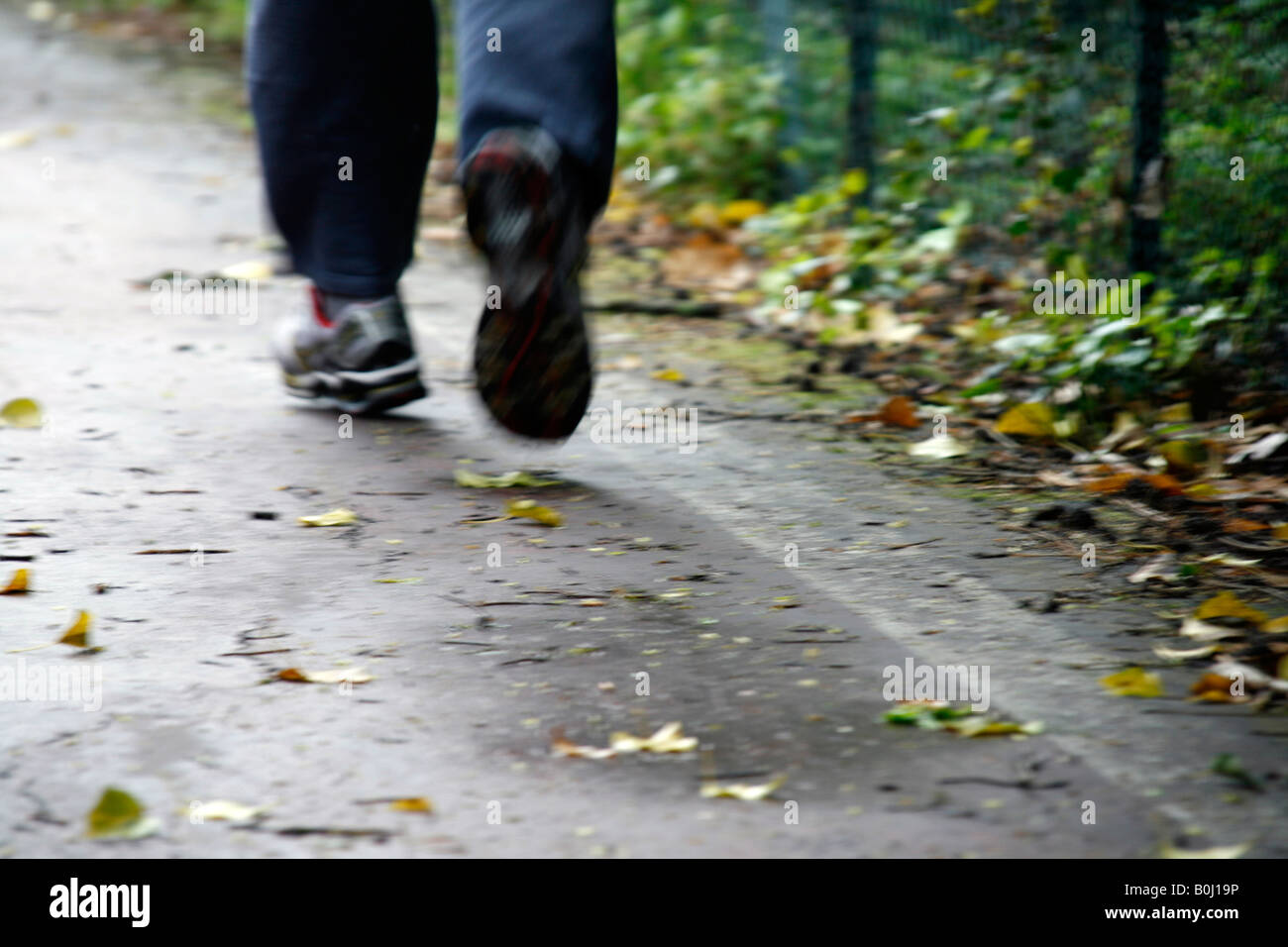 fast man runner on country lane Stock Photo - Alamy