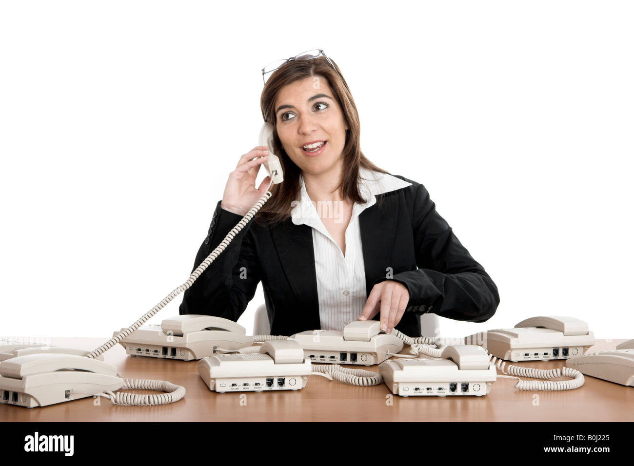 Beautiful woman very busy working on call center Stock Photo - Alamy