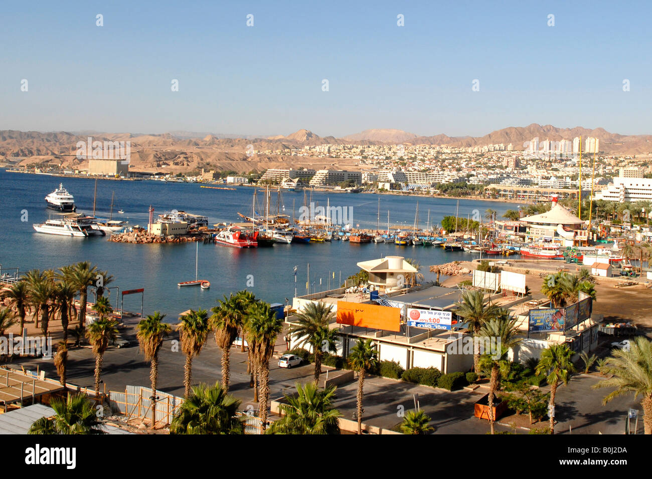 Panorama over the Red Sea bay of Eilat showing the quay , entrance to ...