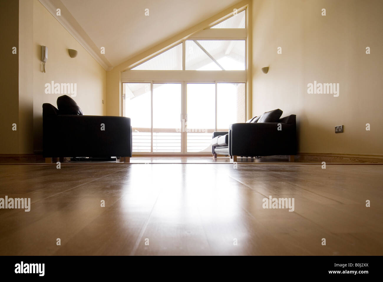 sofa in an empty room Stock Photo - Alamy