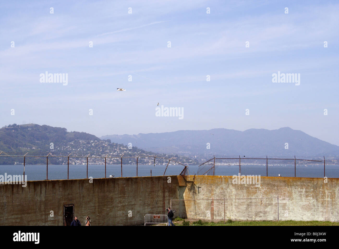 View over Alcatraz Recreation Yard fence into San Francisco bay Stock ...