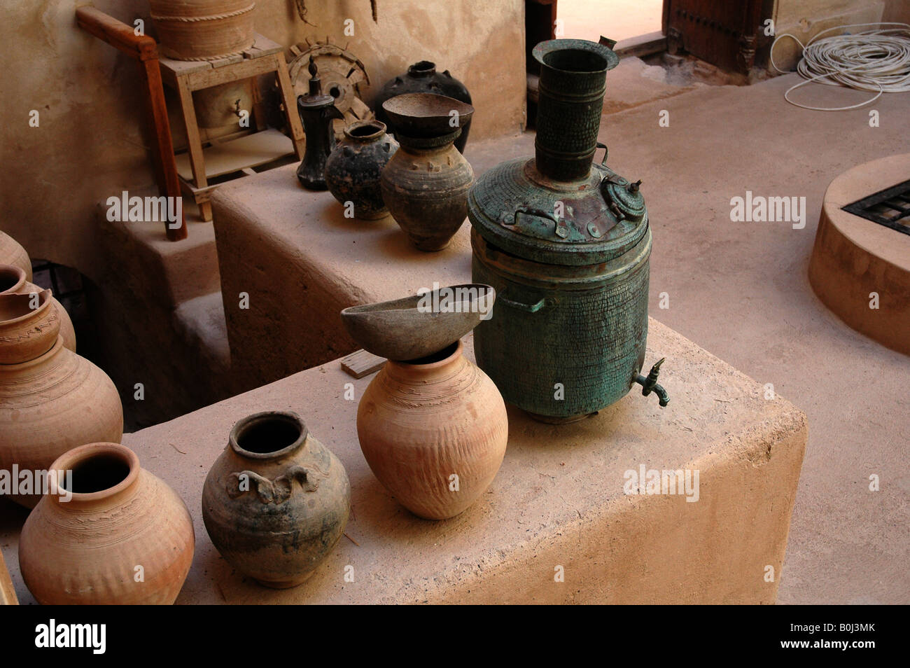 Clay pots in the kitchen of Jabreen Castle Oman Stock Photo - Alamy