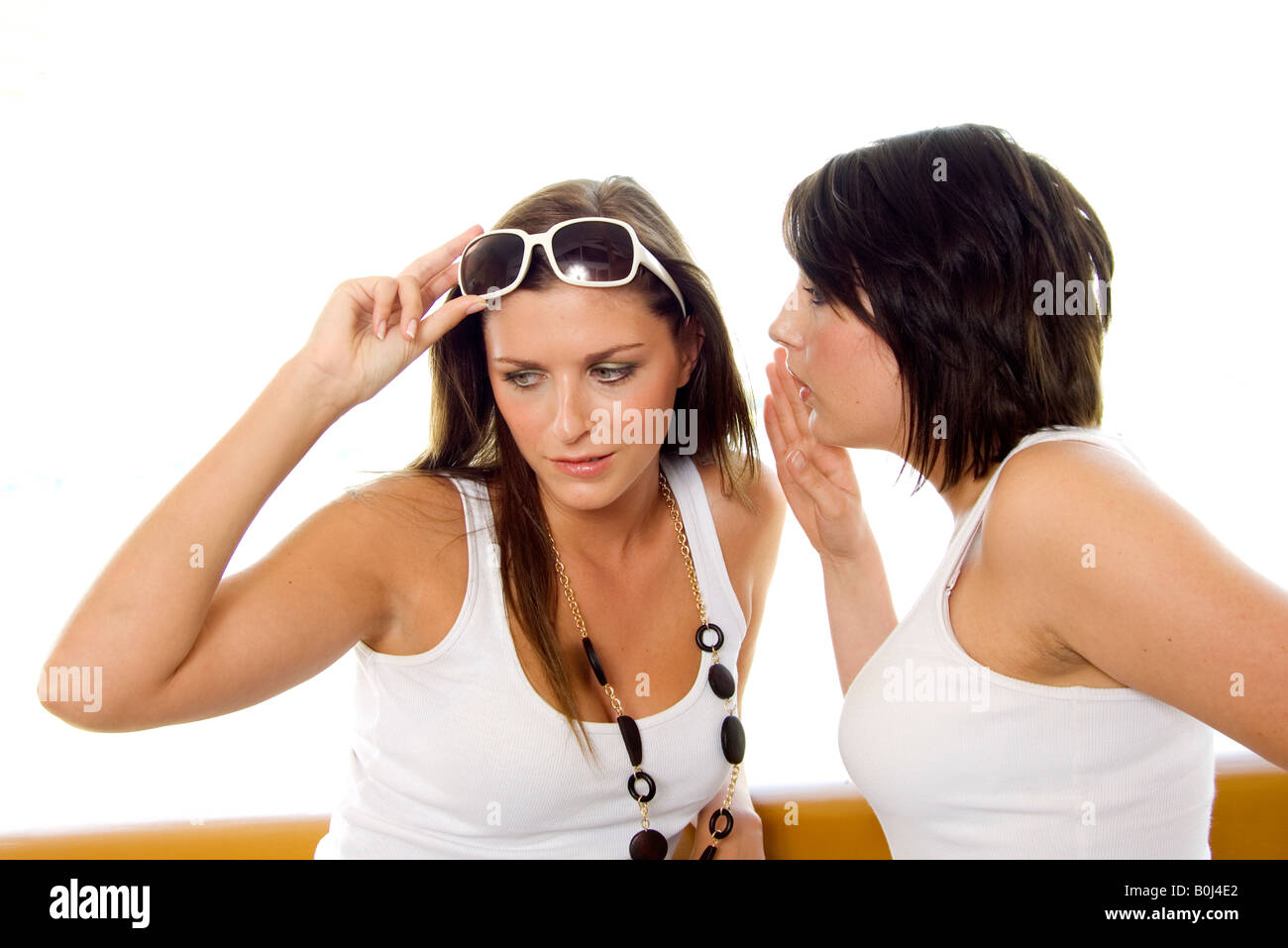 Women women telling secrets hi-res stock photography and images - Alamy