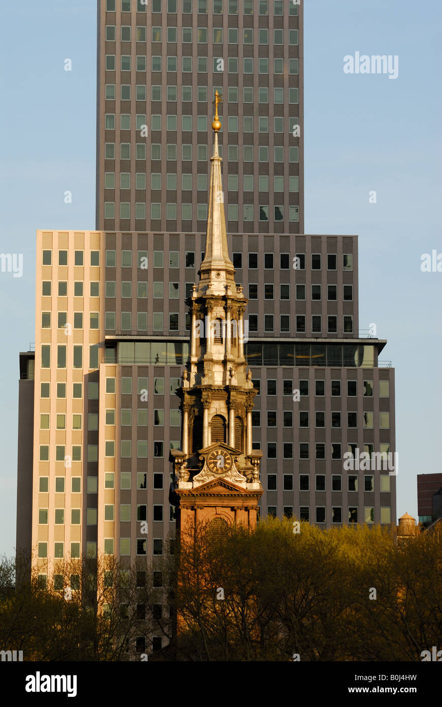 Church in front of a skyscraper hi-res stock photography and images - Alamy
