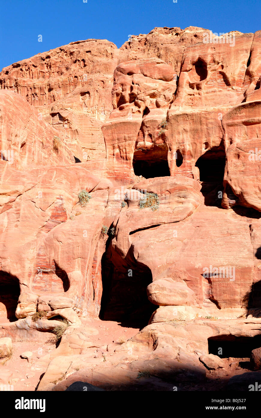 Recently inhabited caves in the stratified salmon pink , gray & red ...