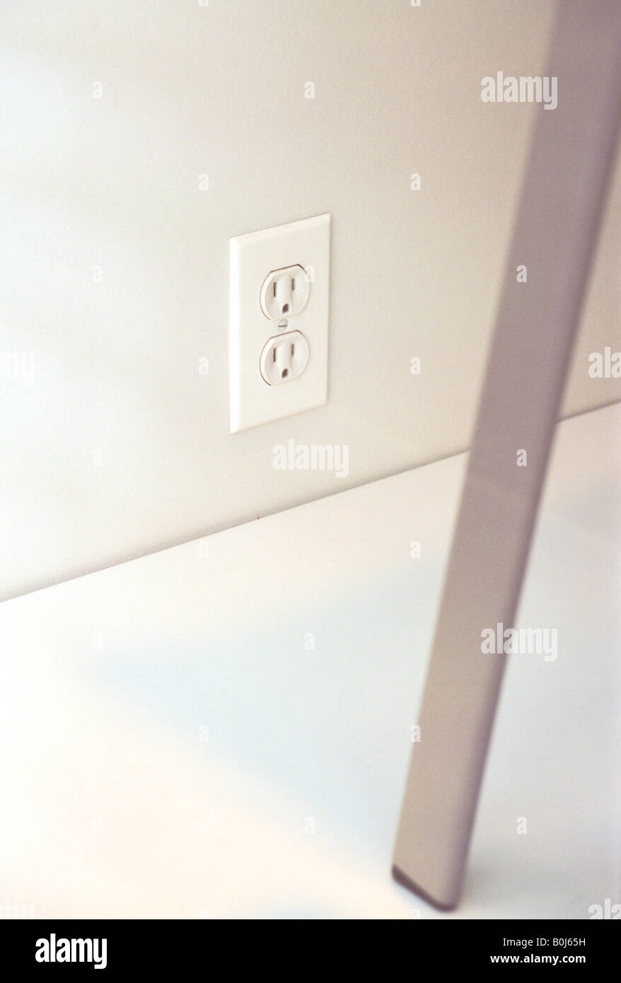 Electric wall power outlet contemporary room scene white wall floor ...