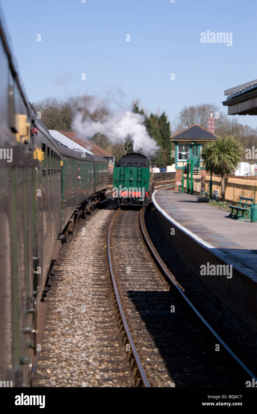 Steam engine (locomotive) reversing on the passing loop at Kingscote ...